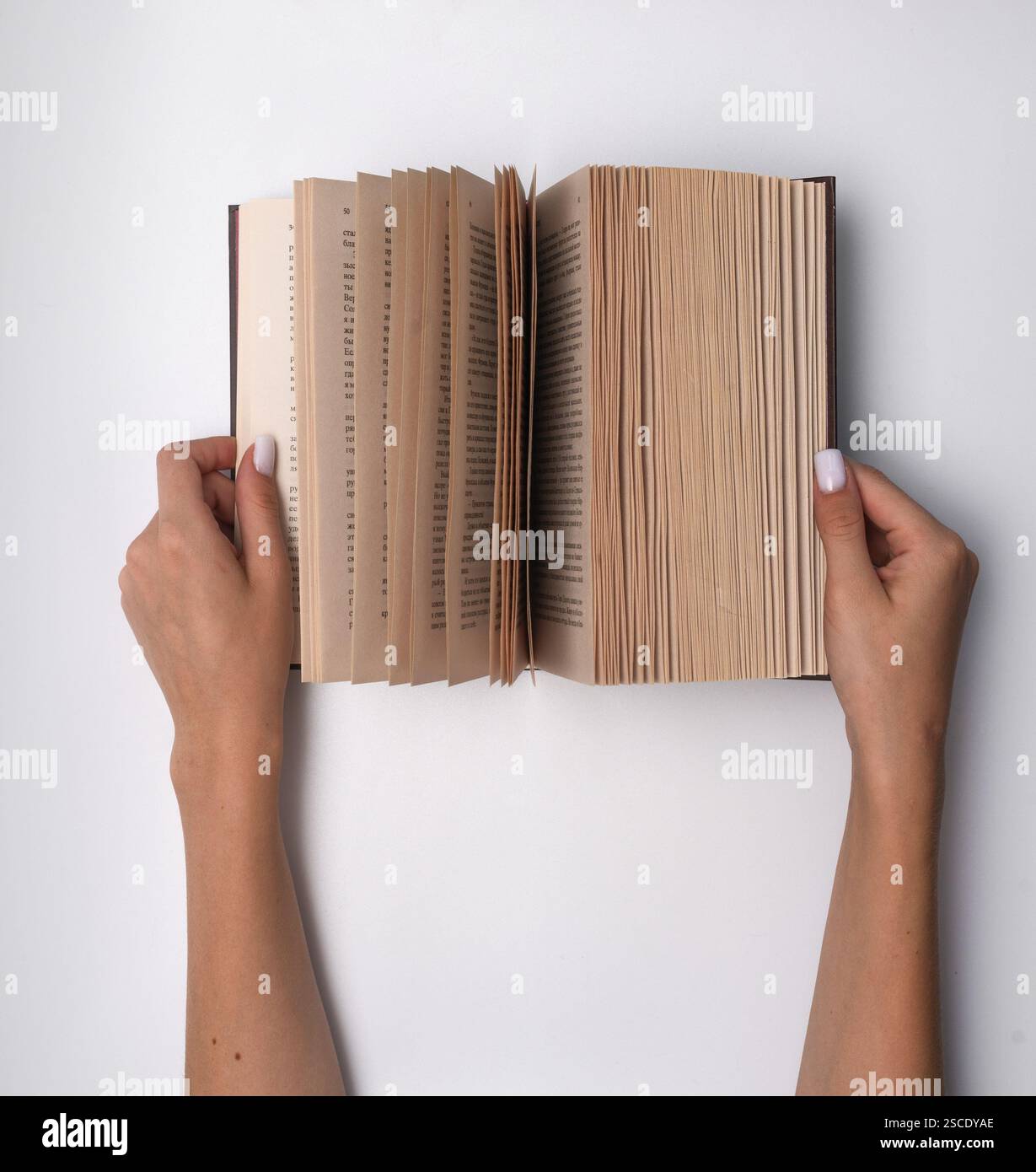 Hands classic book hi-res stock photography and images - Alamy