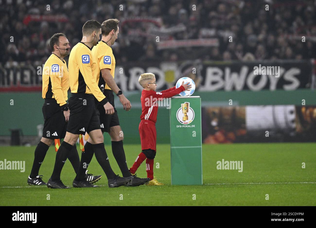 Cup match, ball boy Ballkind takes Adidas Derbystar match ball from the ...