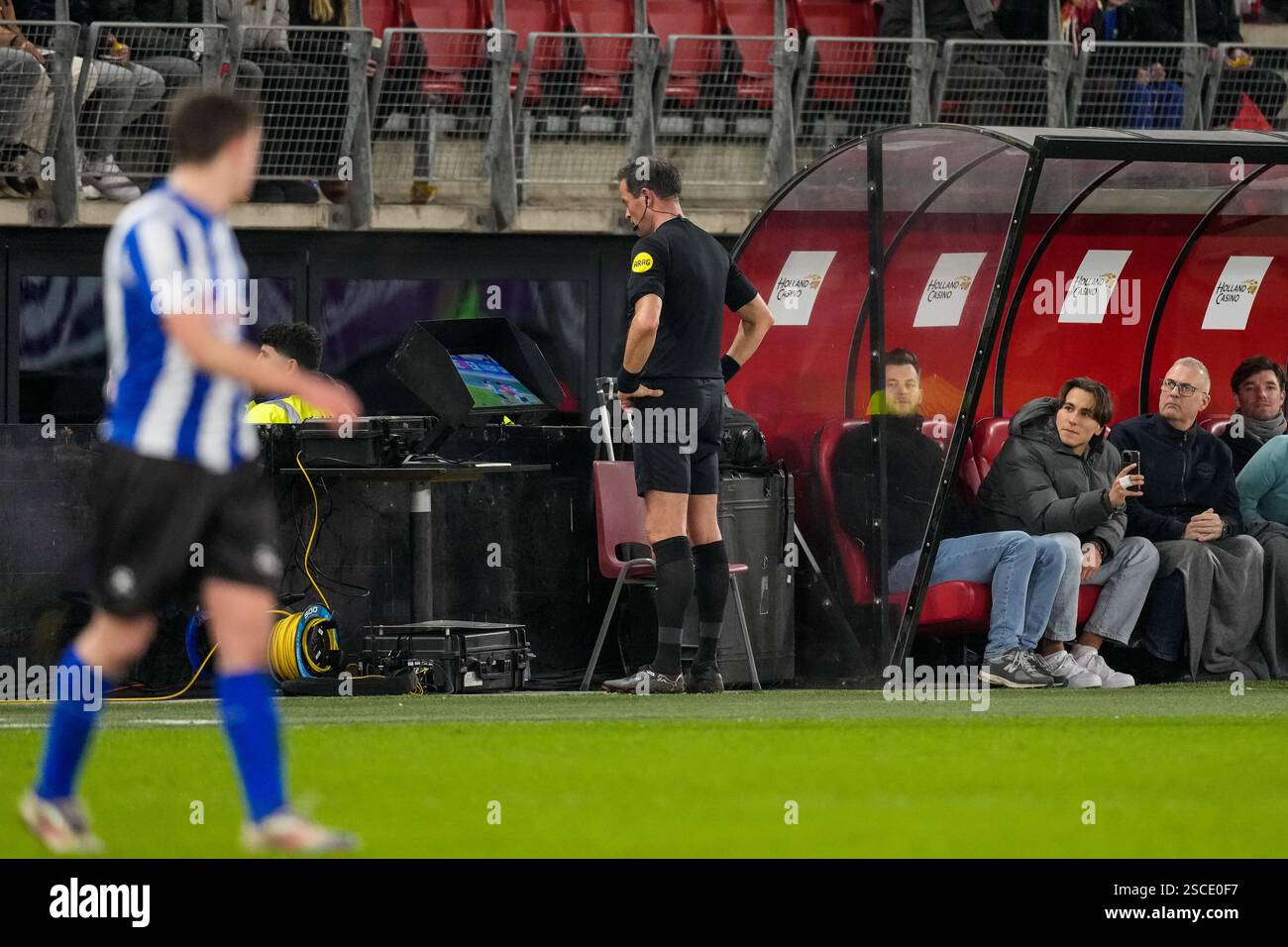 ALKMAAR, NETHERLANDS - FEBRUARY 6: Referee Bas Nijhuis checks VAR for ...