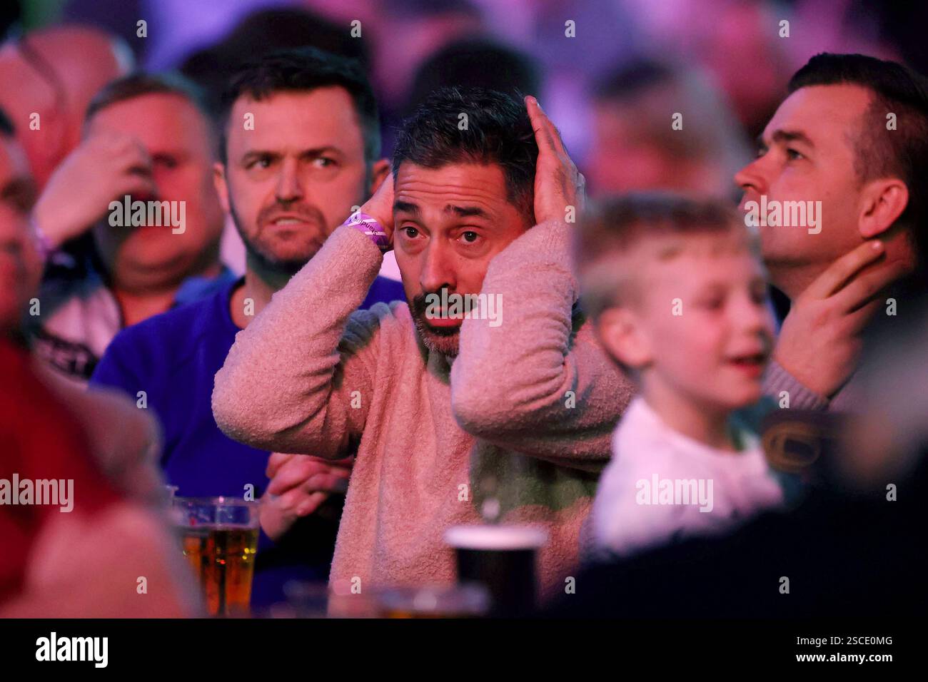 Radio and television presenter Colin Murray watches Stephen Bunting ...