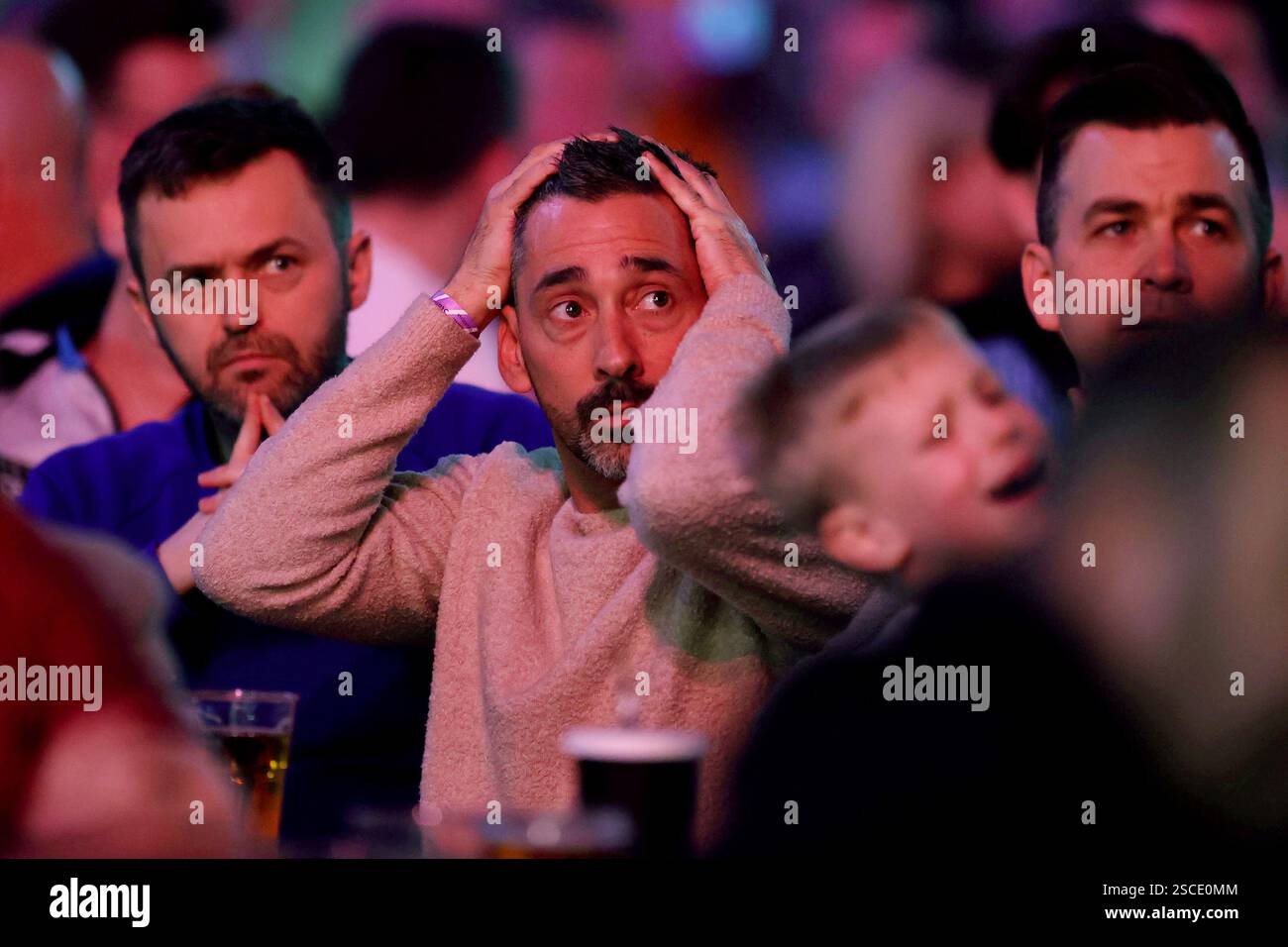 Radio and television presenter Colin Murray watches Stephen Bunting ...