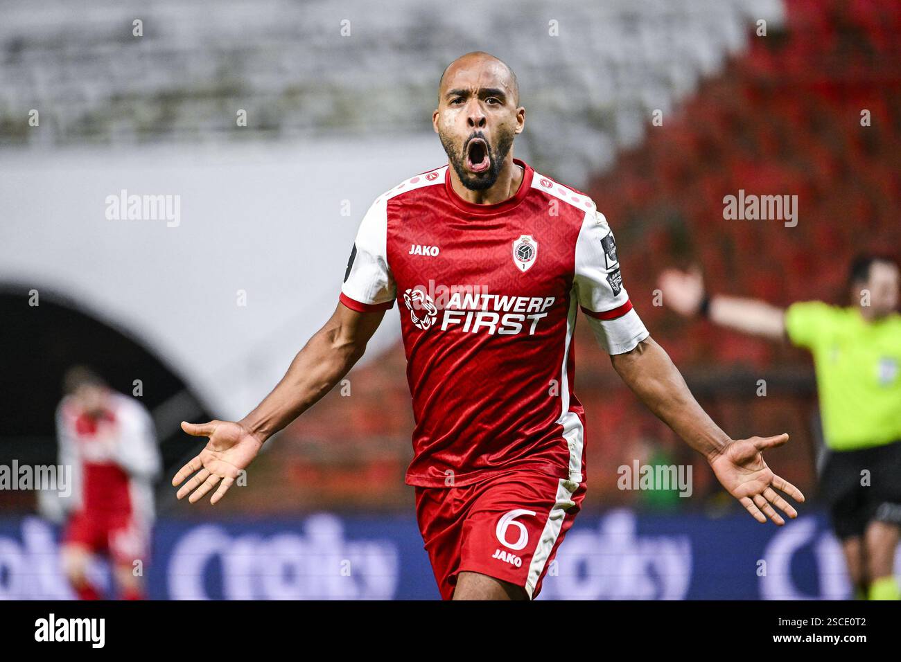 Antwerp's Denis Odoi celebrates after scoring during a soccer game ...