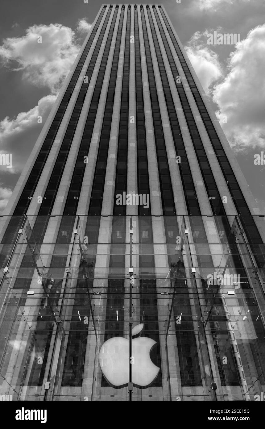 Apple logo in front of a skyscraper in Central Park, New York City, USA ...
