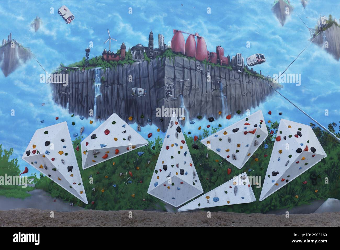 Climbing wall with surreal mural, flying city, by artist duo TUBUKU ...