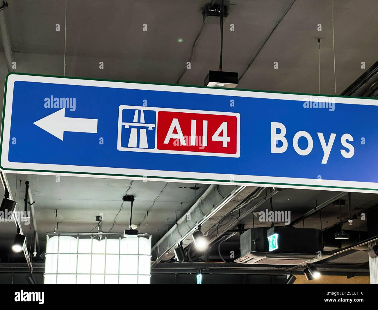 Kyiv, Ukraine - February 05, 2025: Indoor directional sign with symbols ...