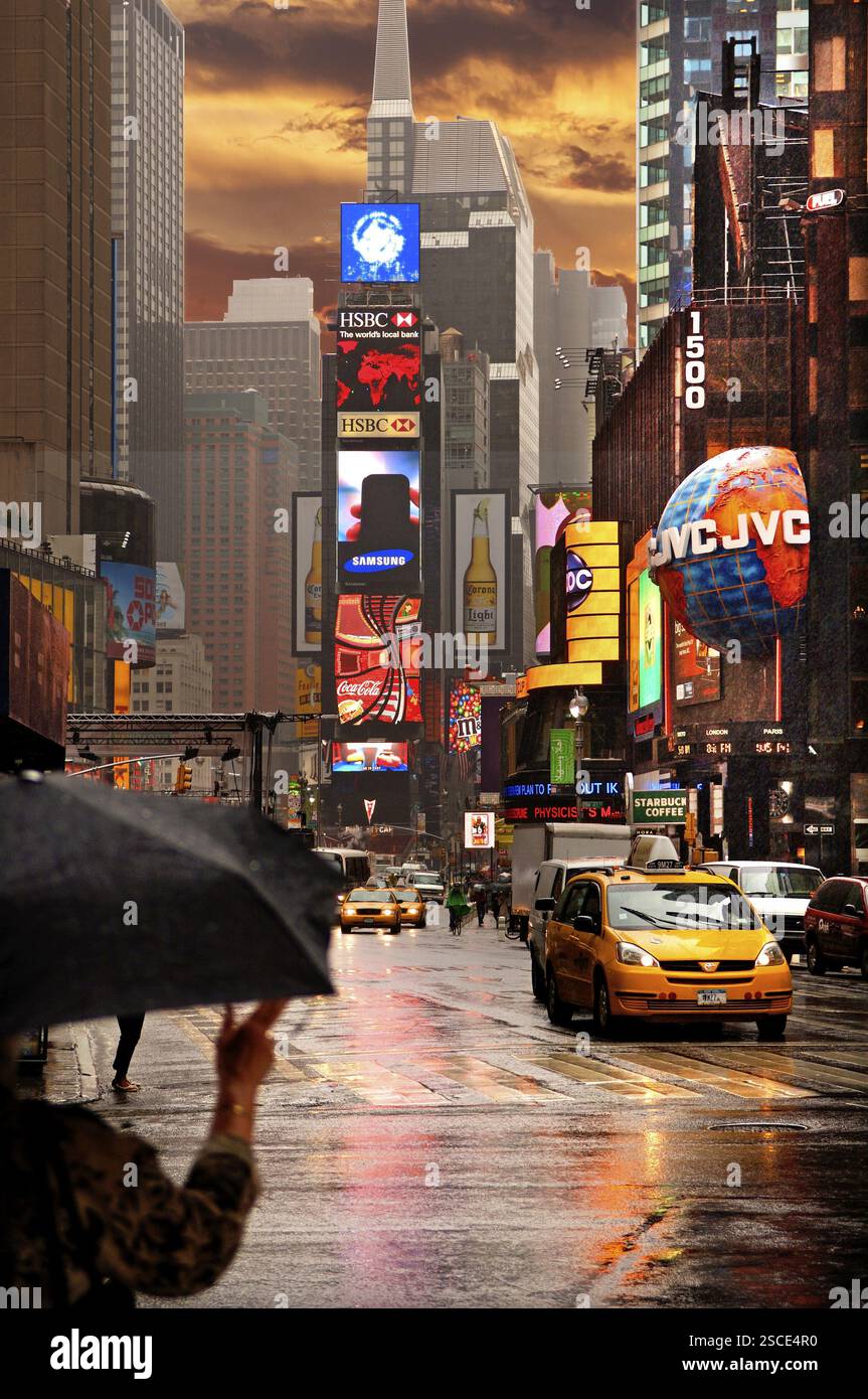 Evening Times Sqaure with illuminated advertising in the rain, New York ...