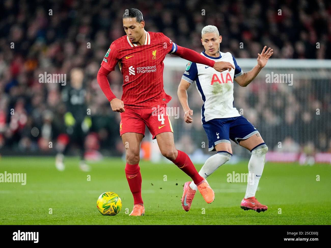 Liverpool's Virgil van Dijk (left) and Tottenham Hotspur's Richarlison ...