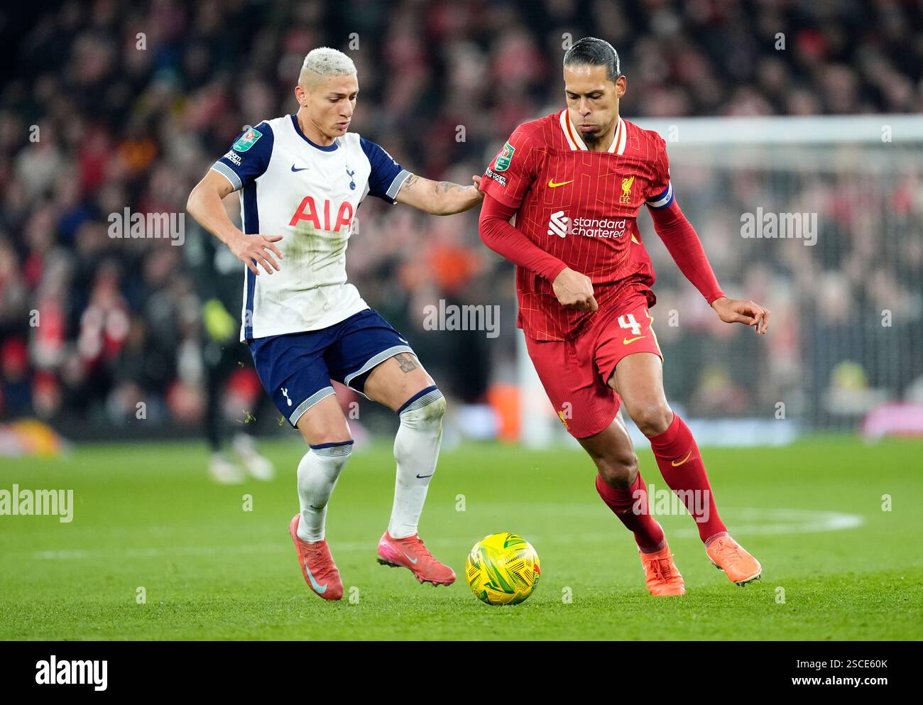 Tottenham Hotspur's Richarlison (left) and Liverpool's Virgil van Dijk ...