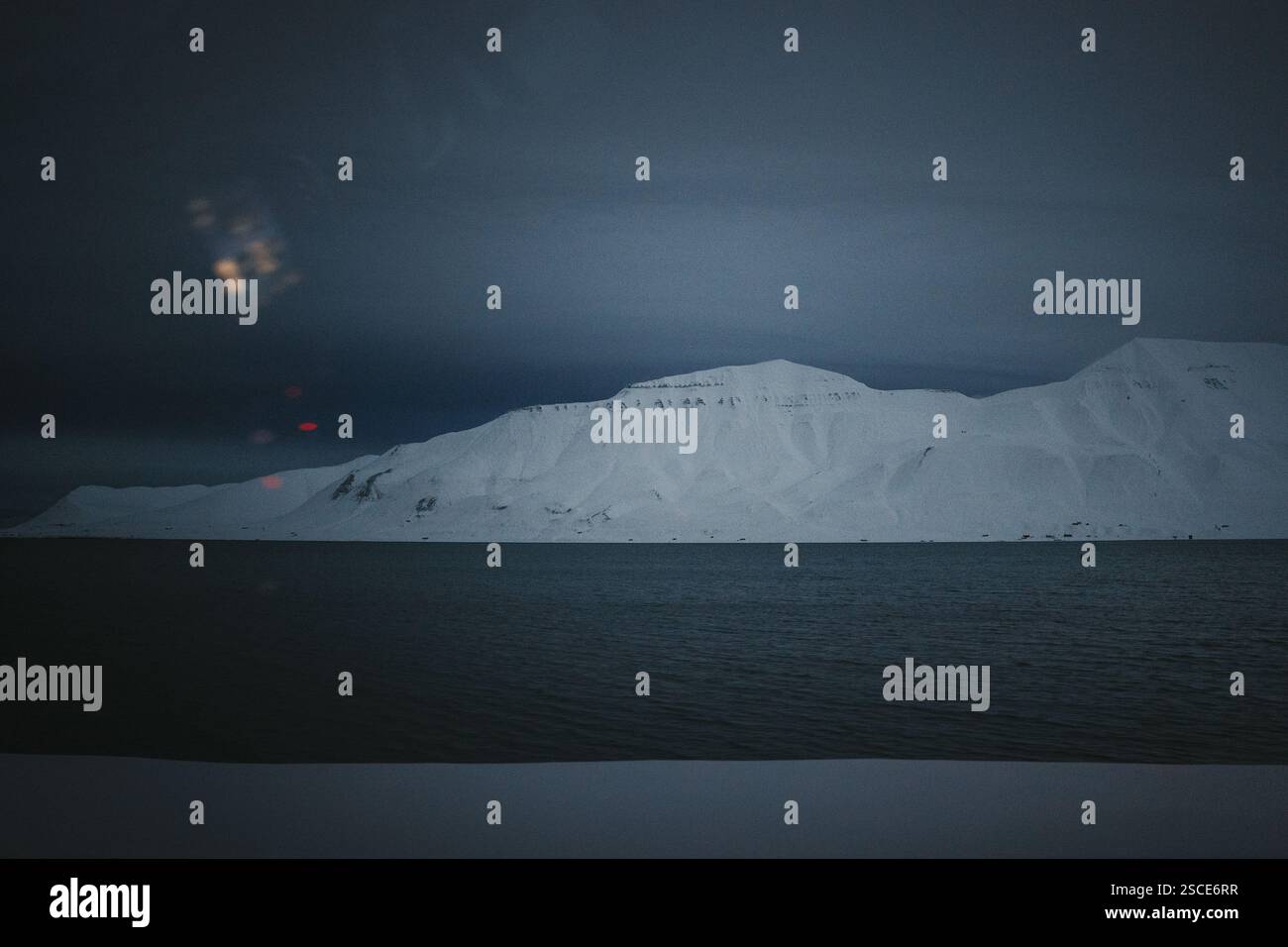 Snowy arctic fjord view from car window in the arctic, Longyearbyen ...
