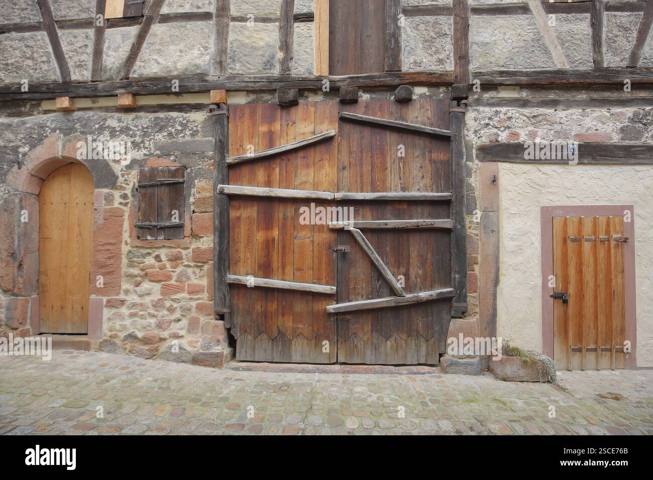 House wall with gates and doors, historic building, wooden construction ...