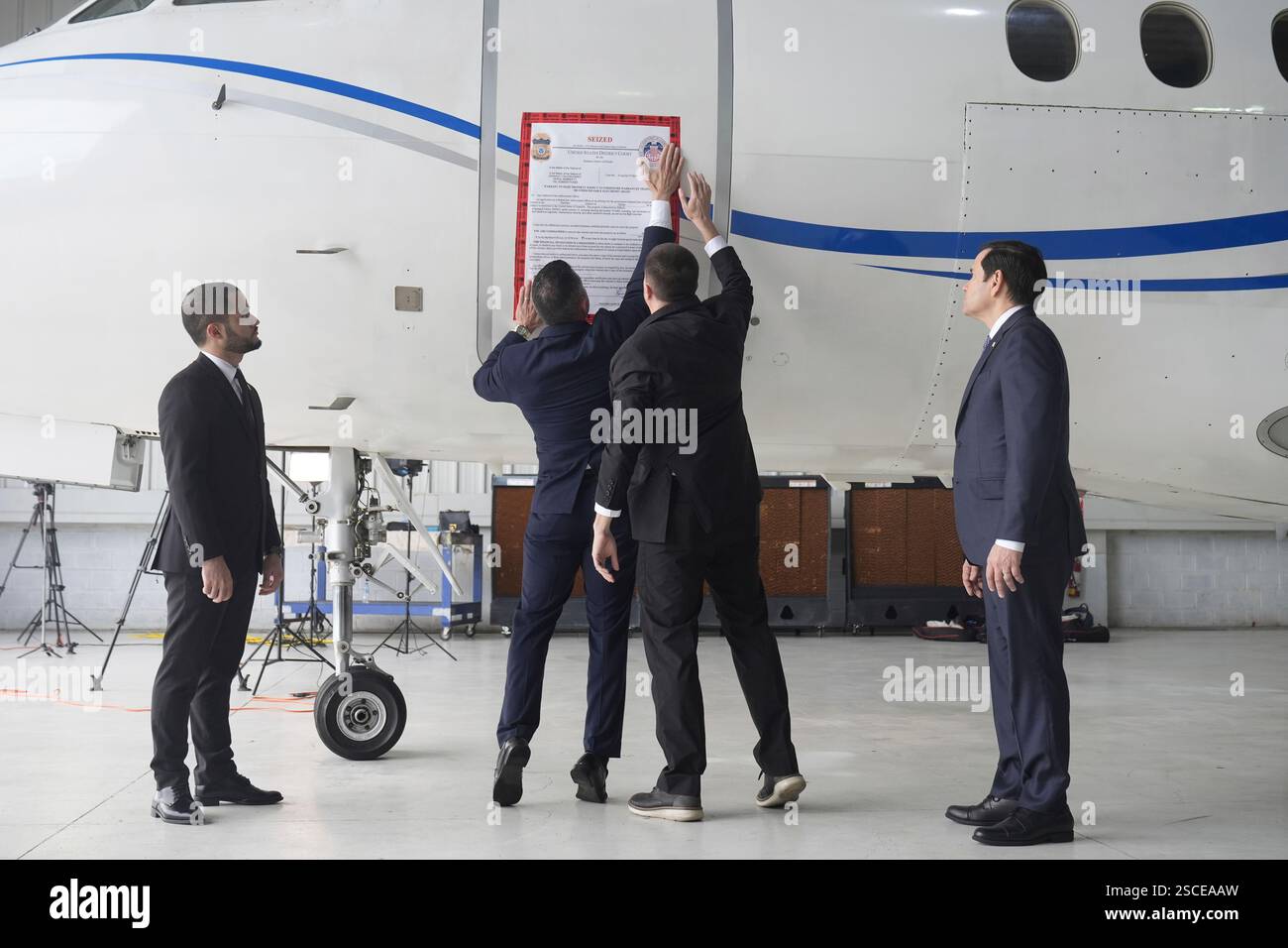 A "seized" sign is placed on a Venezuelan government airplane during a ...