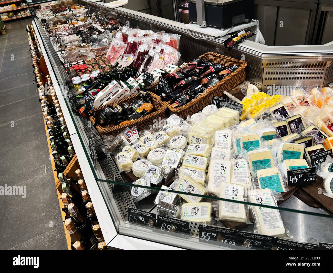 Kyiv, Ukraine - February 05, 2025: A display of various cheeses and ...