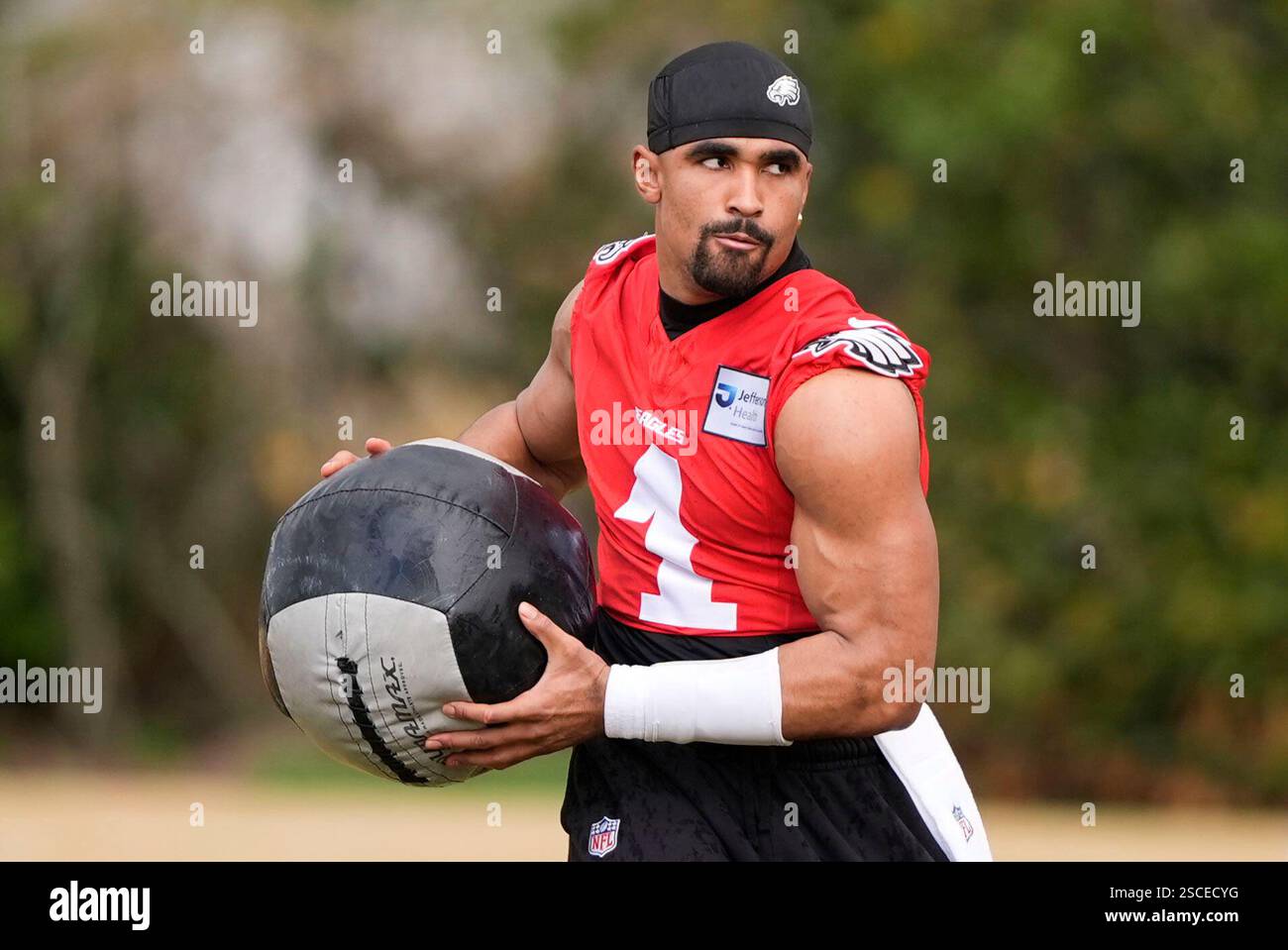 Philadelphia Eagles quarterback Jalen Hurts (1) warms up during an NFL ...