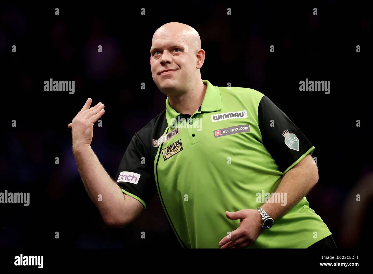 Michael van Gerwen reacts during his match against Luke Littler on ...
