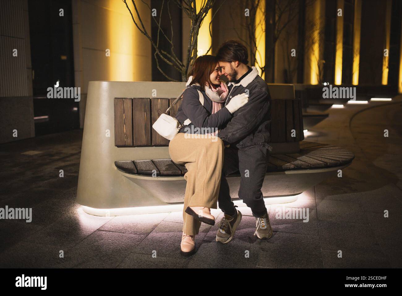 Loving couple embraces on city hi-res stock photography and images - Alamy
