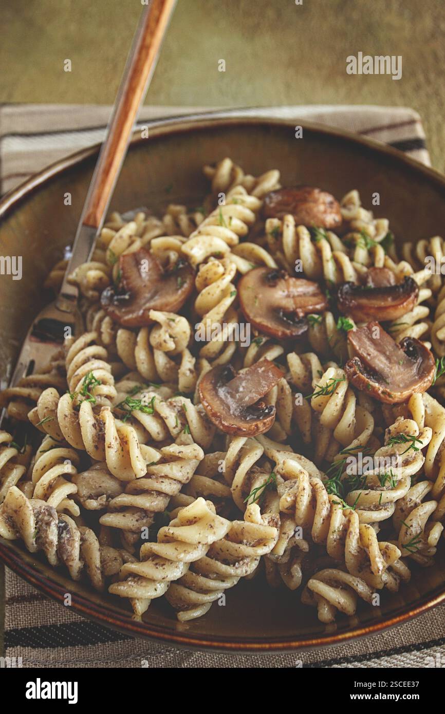 Fusilli pasta, in creamy mushroom sauce, pasta with mushrooms, homemade ...