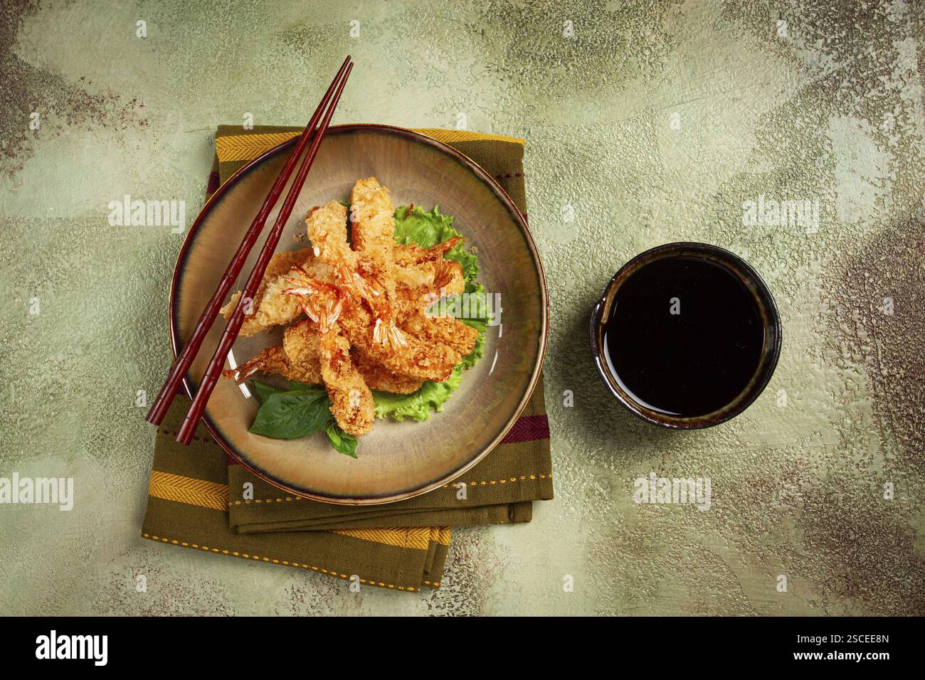 Shrimp in tempura, deep fried, with soy sauce, close-up, top view ...
