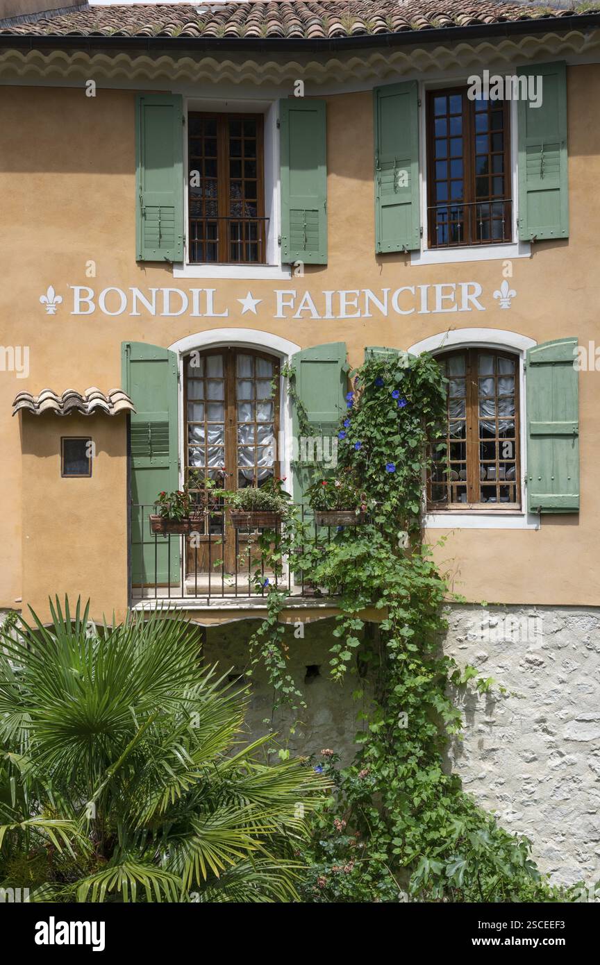 The sunny yellow facade of Bondil, one of the most famous faience ...