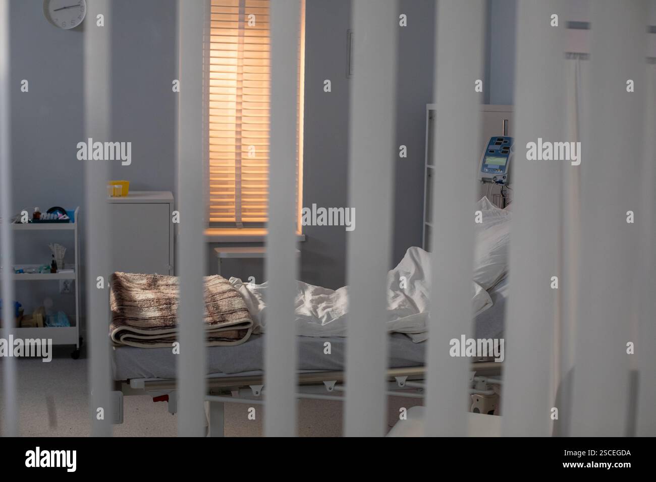 A peaceful hospital room filled with natural light, designed for ...