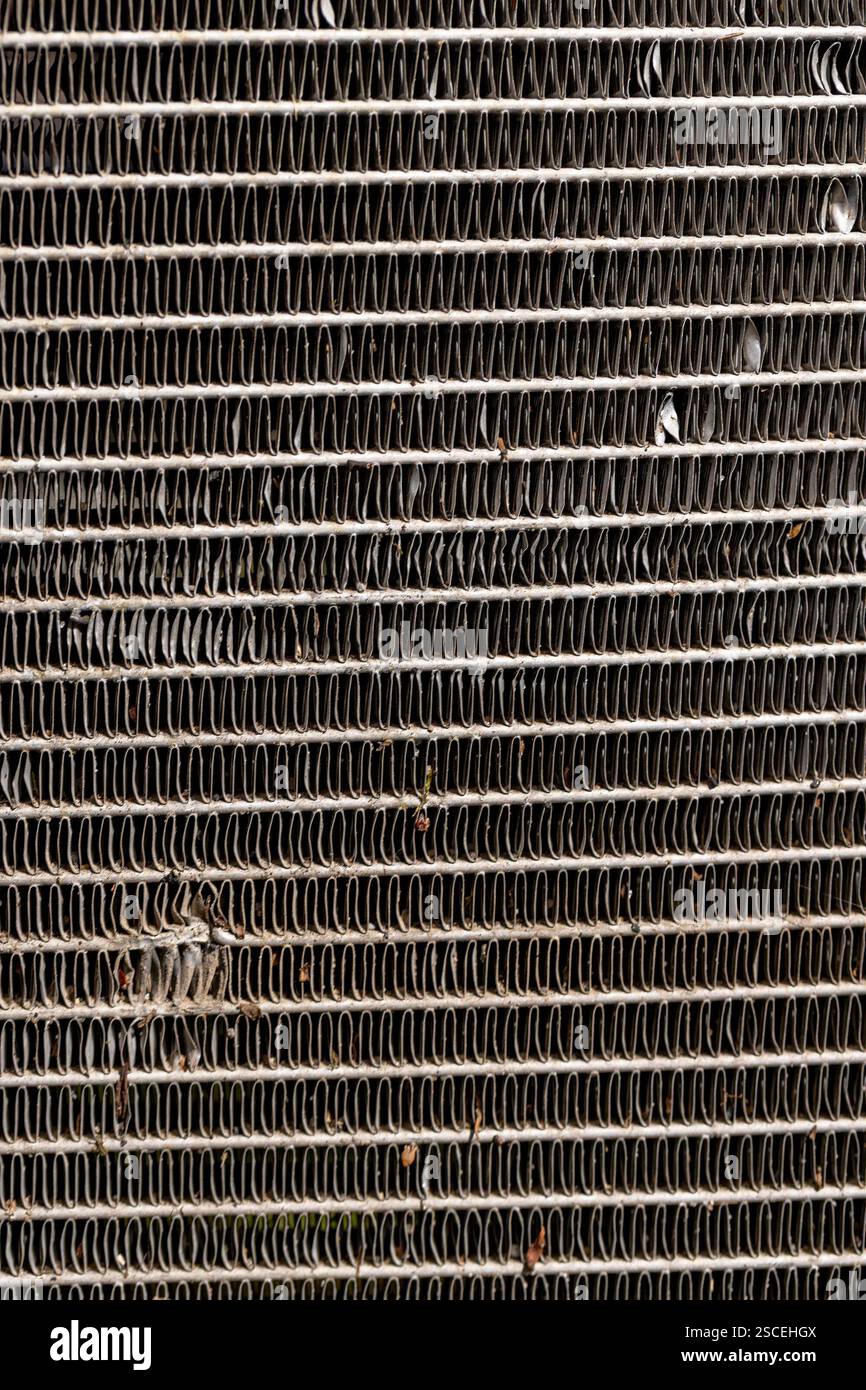 an car radiator damaged after an accident close up, a radiator damaged ...