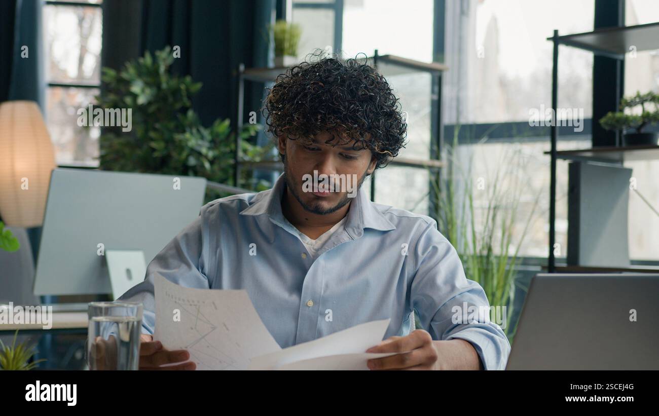 Focused businessman business person accountant office worker writing ...