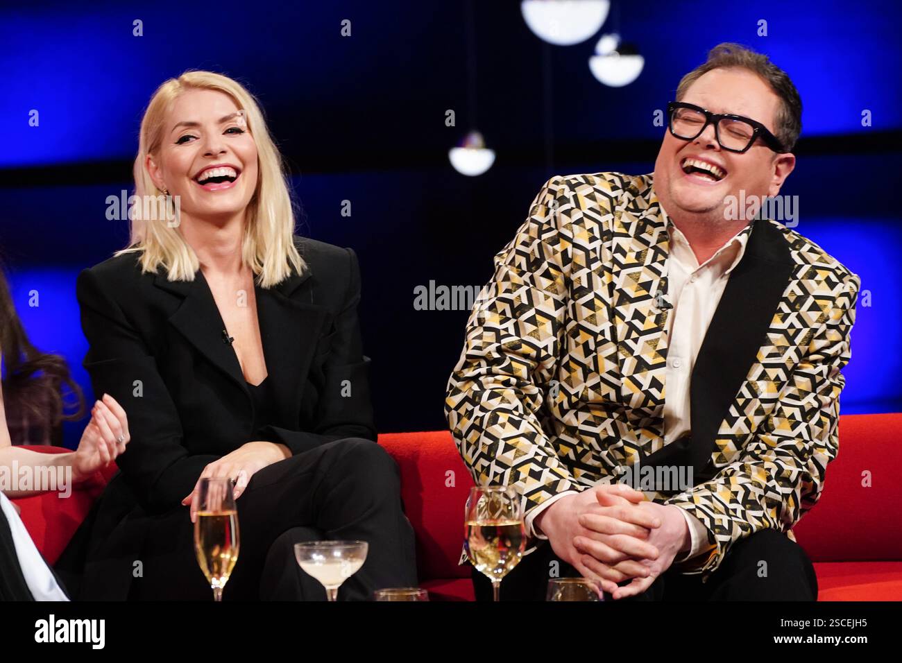 EDITORIAL USE ONLY Holly Willoughby and Alan Carr during filming for the Graham Norton Show, at ...