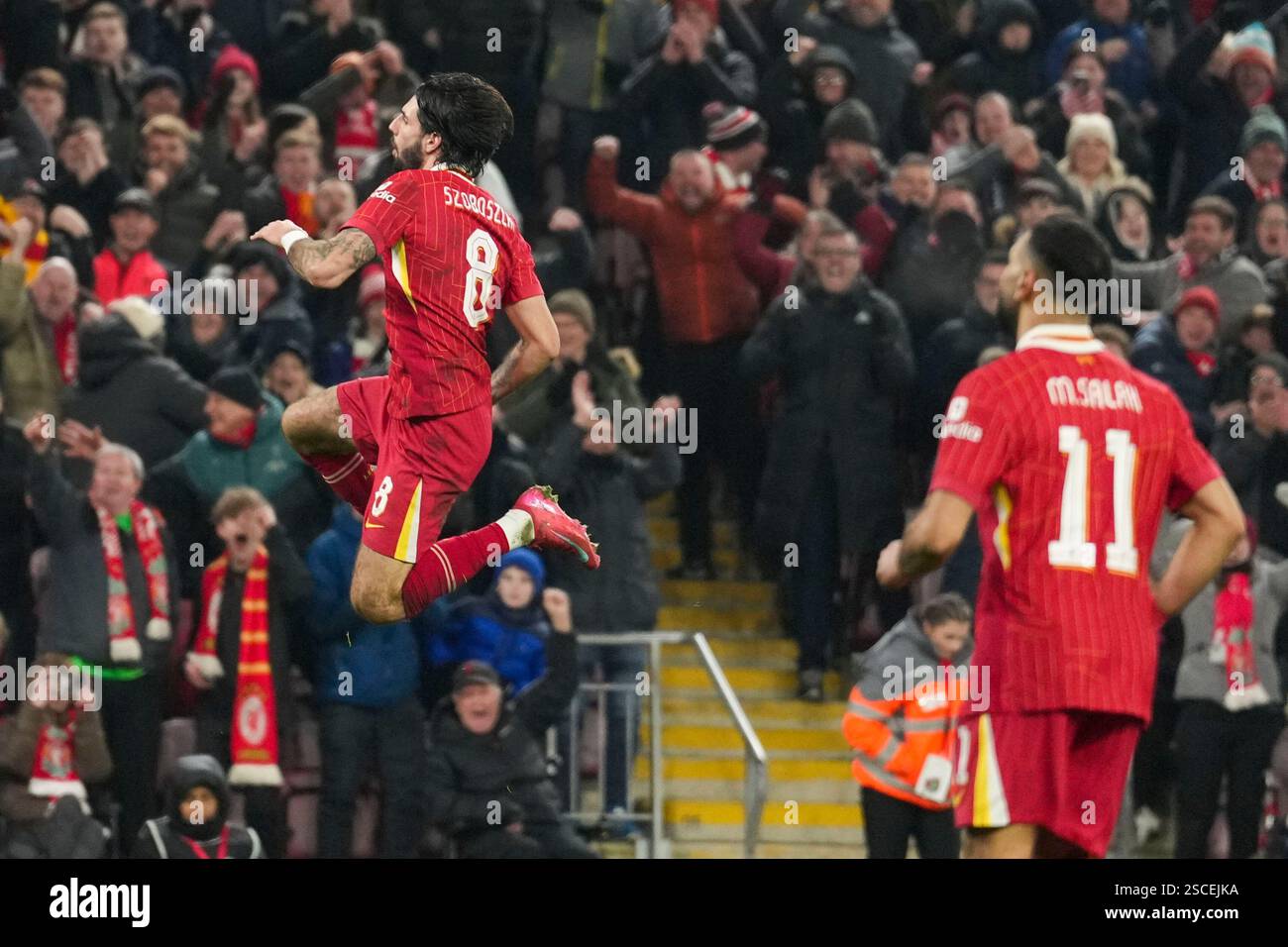 Liverpool's Dominik Szoboszlai celebrates scoring his side's third goal ...