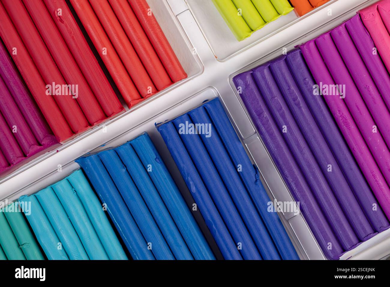 plasticine of different colors for modeling closeup, a simple colored ...