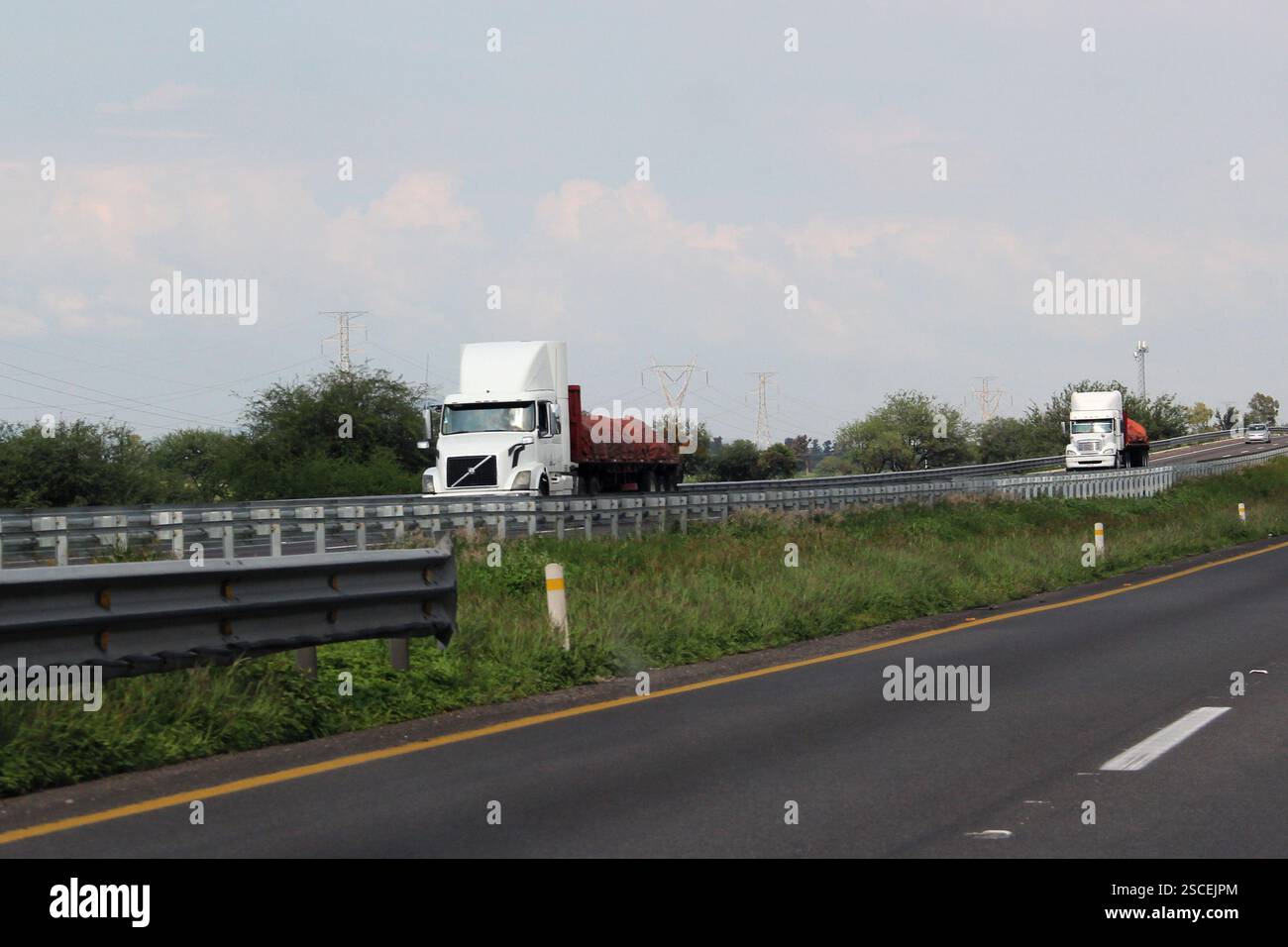 Queretaro, Mexico - Jul 28 2024: Trailers on the highway from CDMX to ...