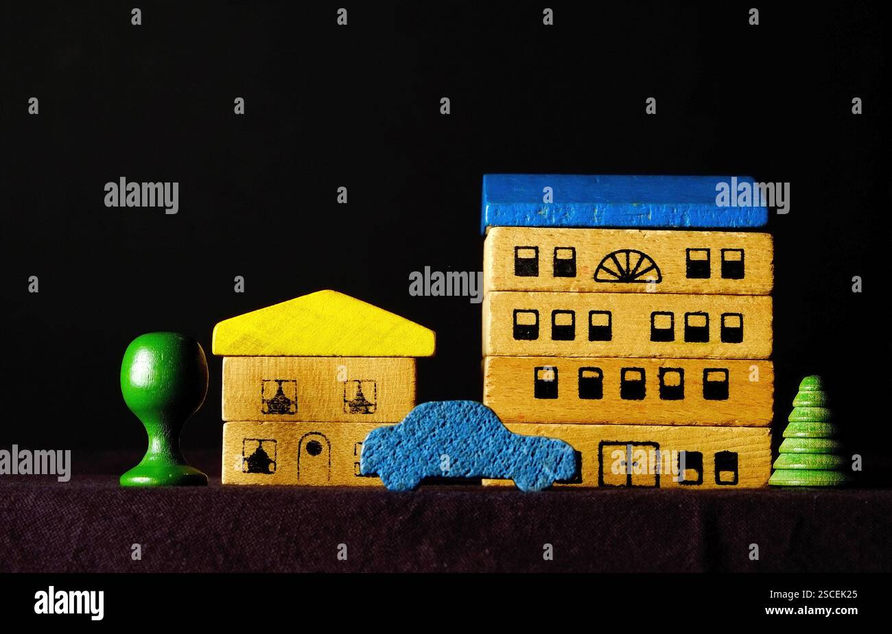 A child's wooden blocks depict a street scene Stock Photo - Alamy