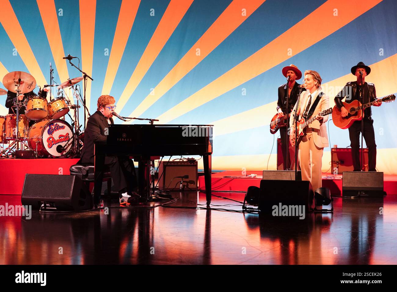 EDITORIAL USE ONLY Elton John and Brandi Carlile during filming for the ...