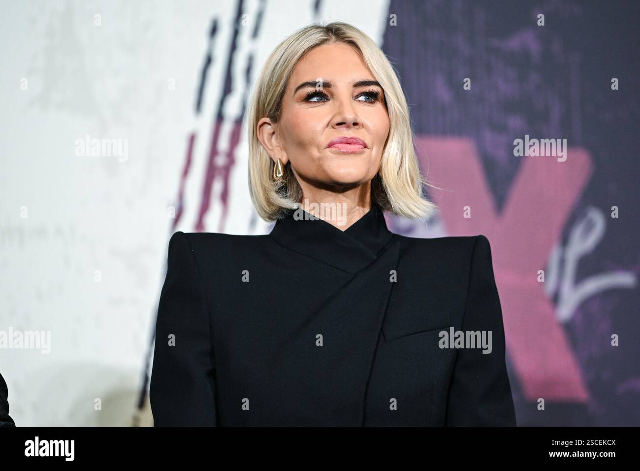 Charissa Jean Thompson stands on stage during the Fox Sports Media Day ...
