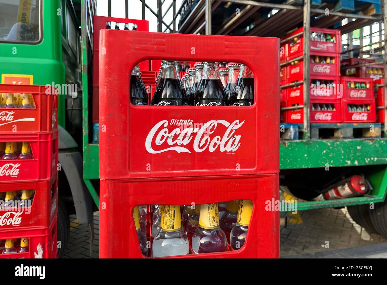Plastic Coca-Cola crates being unloaded from a Delivery Lorry in Costa ...
