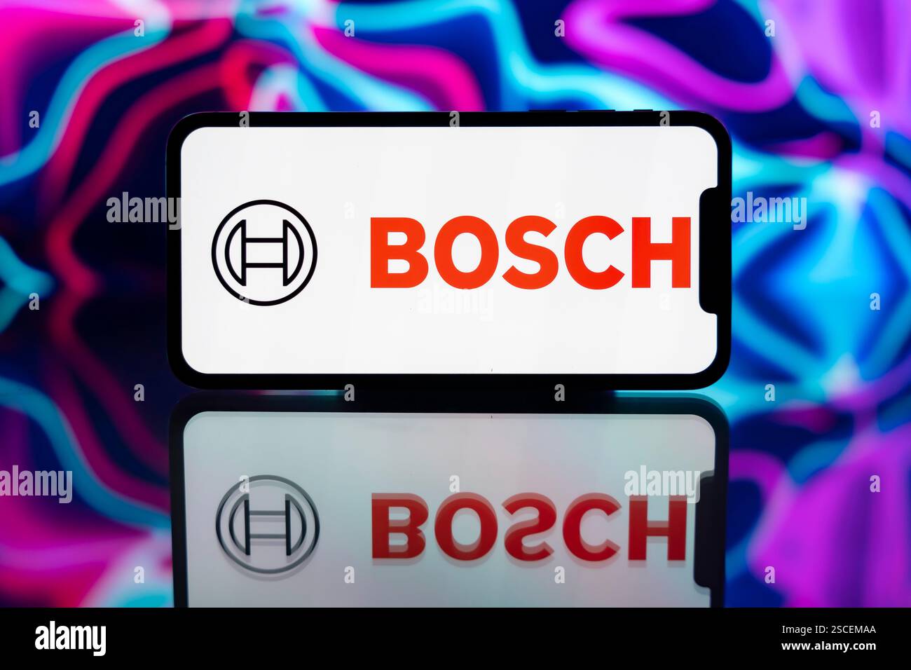 In this photo illustration, the Bosch logo is seen displayed on a ...