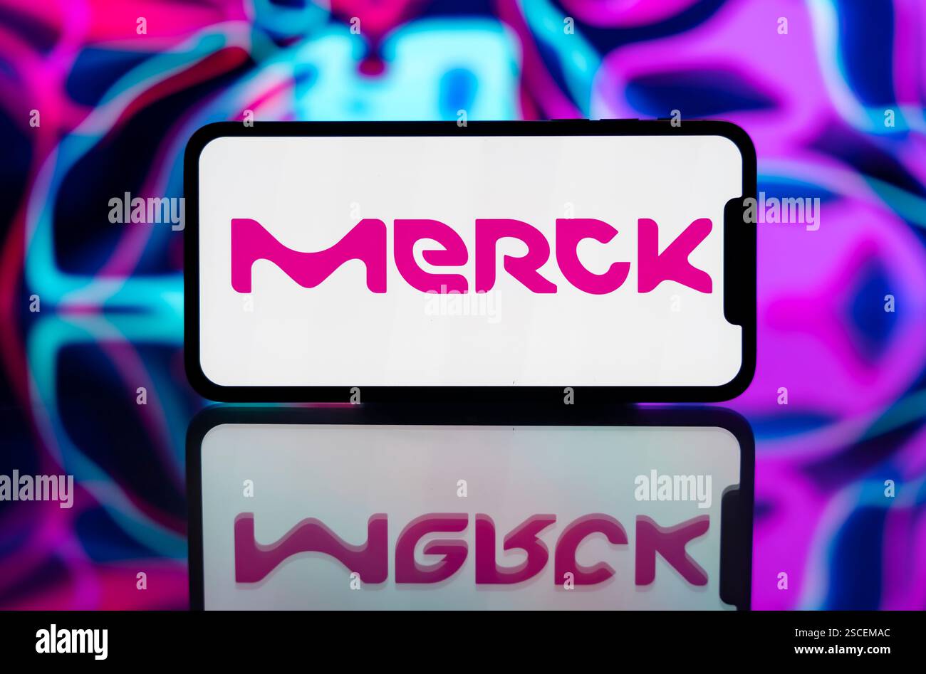 In this photo illustration, the Merck KGaA logo is seen displayed on a ...