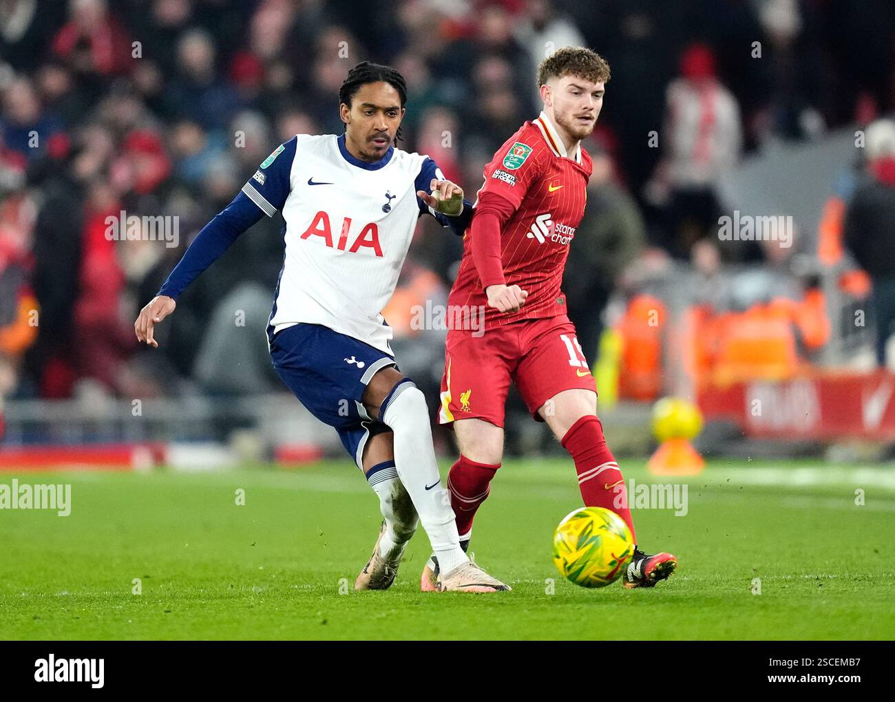 Tottenham Hotspur's Djed Spence (left) and Liverpool's Harvey Elliott ...