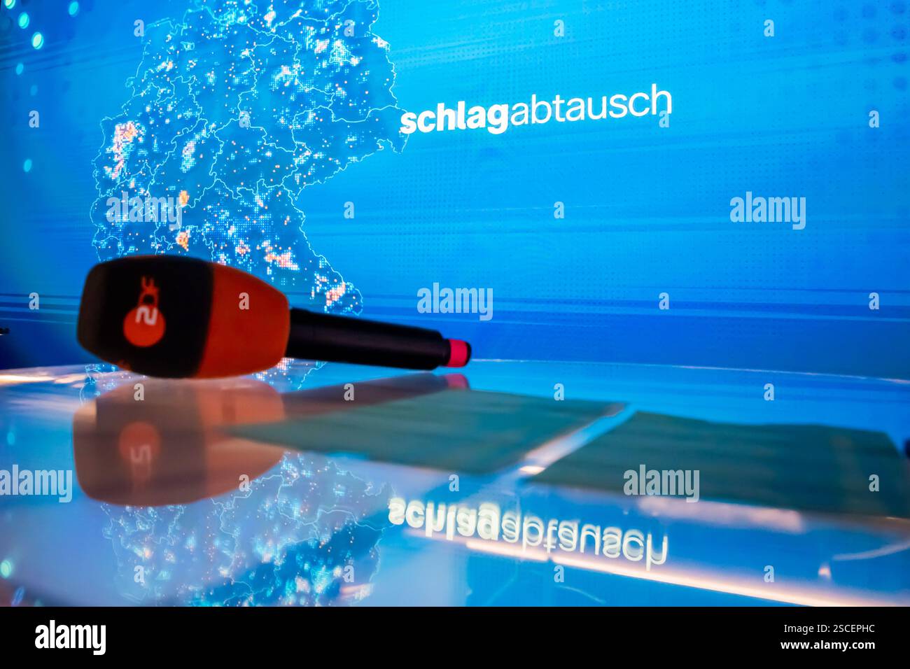 Berlin, Germany. 06th Feb, 2025. A ZDF microphone lies on the presenter ...