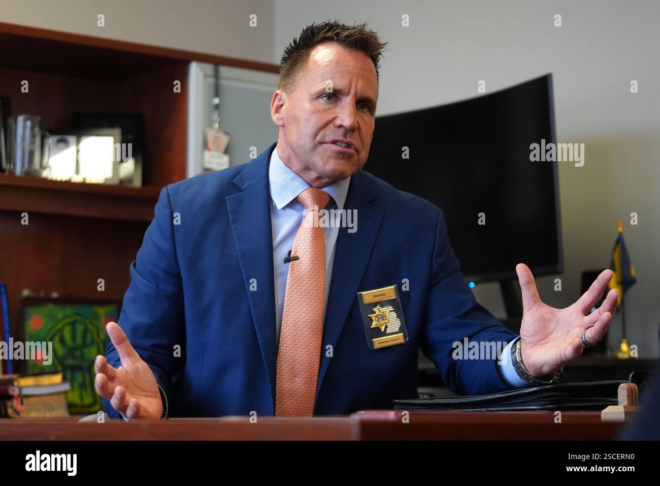 Genesee County Sheriff Chris Swanson talks in his office, Jan. 28, 2025 ...