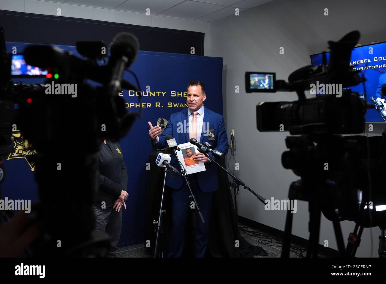 Genesee County Sheriff Chris Swanson talks during a news conference ...