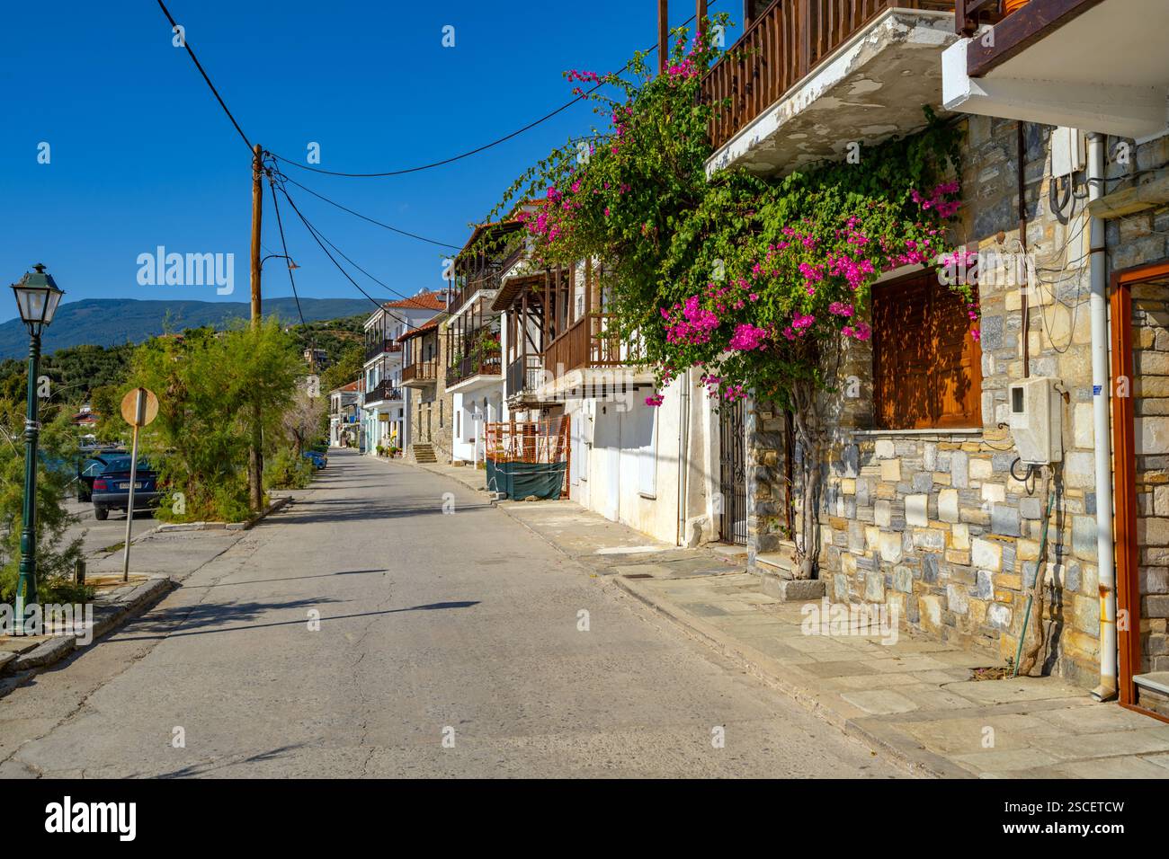 The Main Street in Afissos on the west coast of the Pelion Peninsula ...