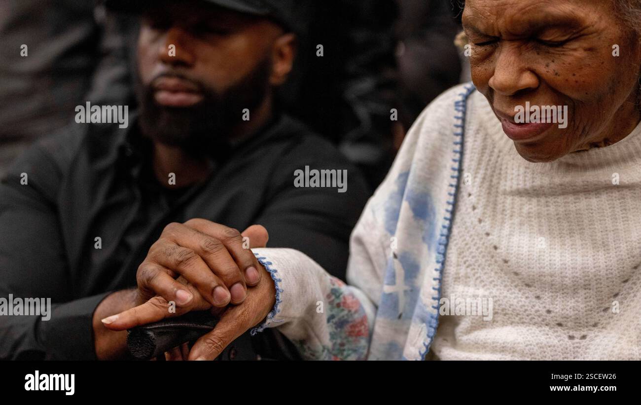 Pasadena, California, USA. 6th Feb, 2025. Zaire Calvin holds his mother ...