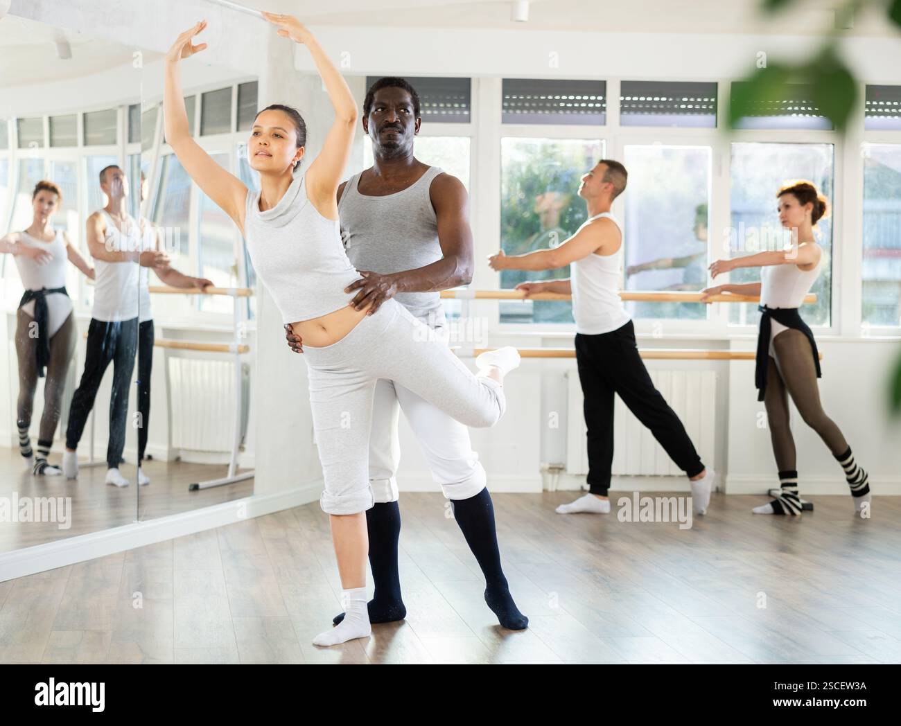 Man and woman dancing couples ballet dance together Stock Photo - Alamy