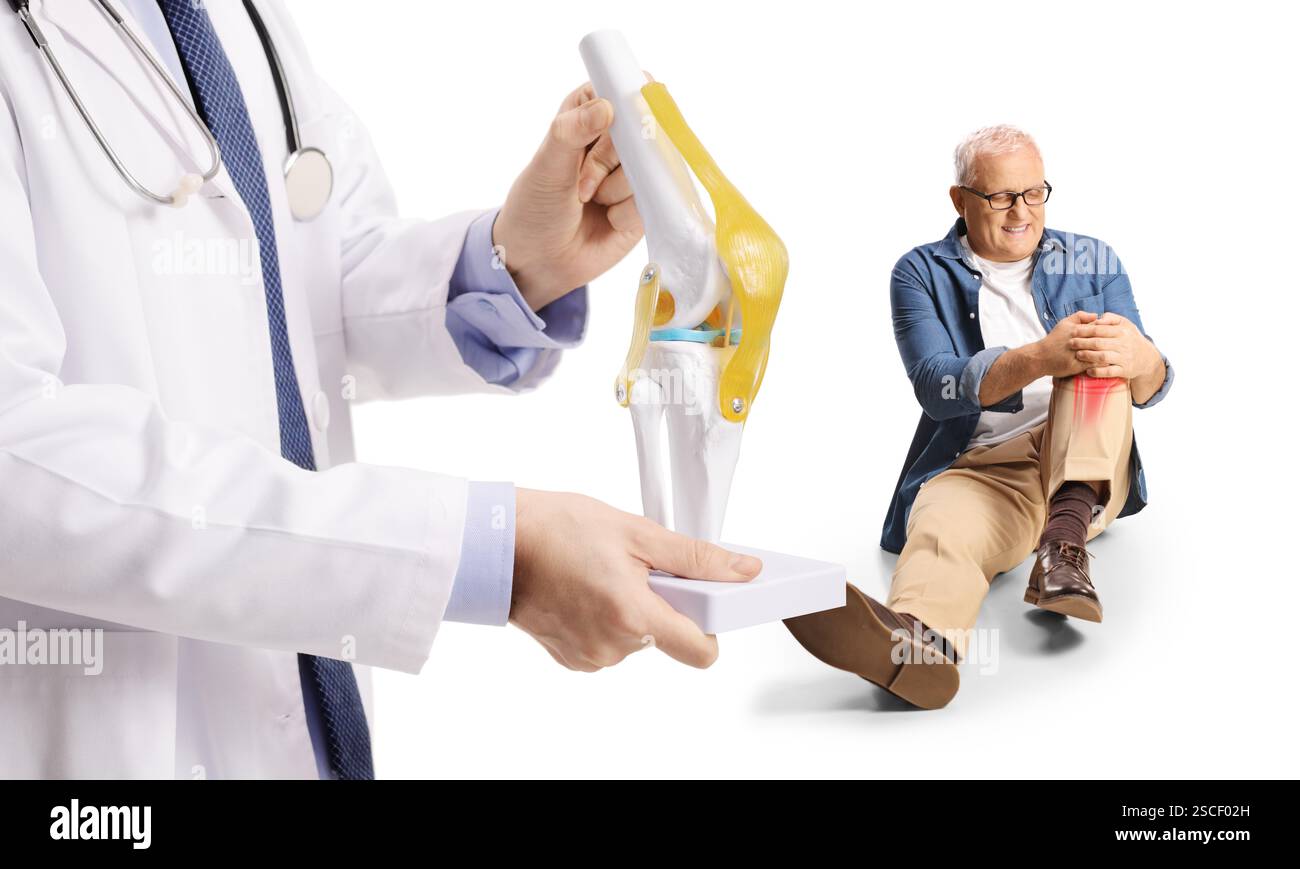 Man with a knee injury and doctor holding a model of a human knee bone ...