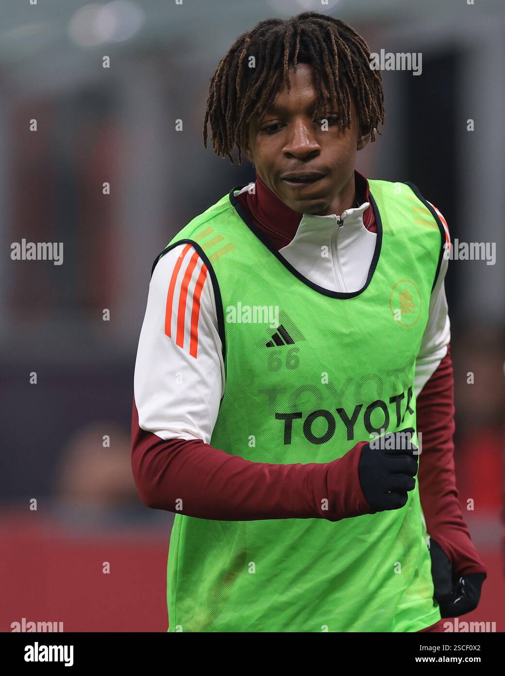 Milan, Italy. 5th Feb, 2025. Buba Sangare of AS Roma warms up during ...