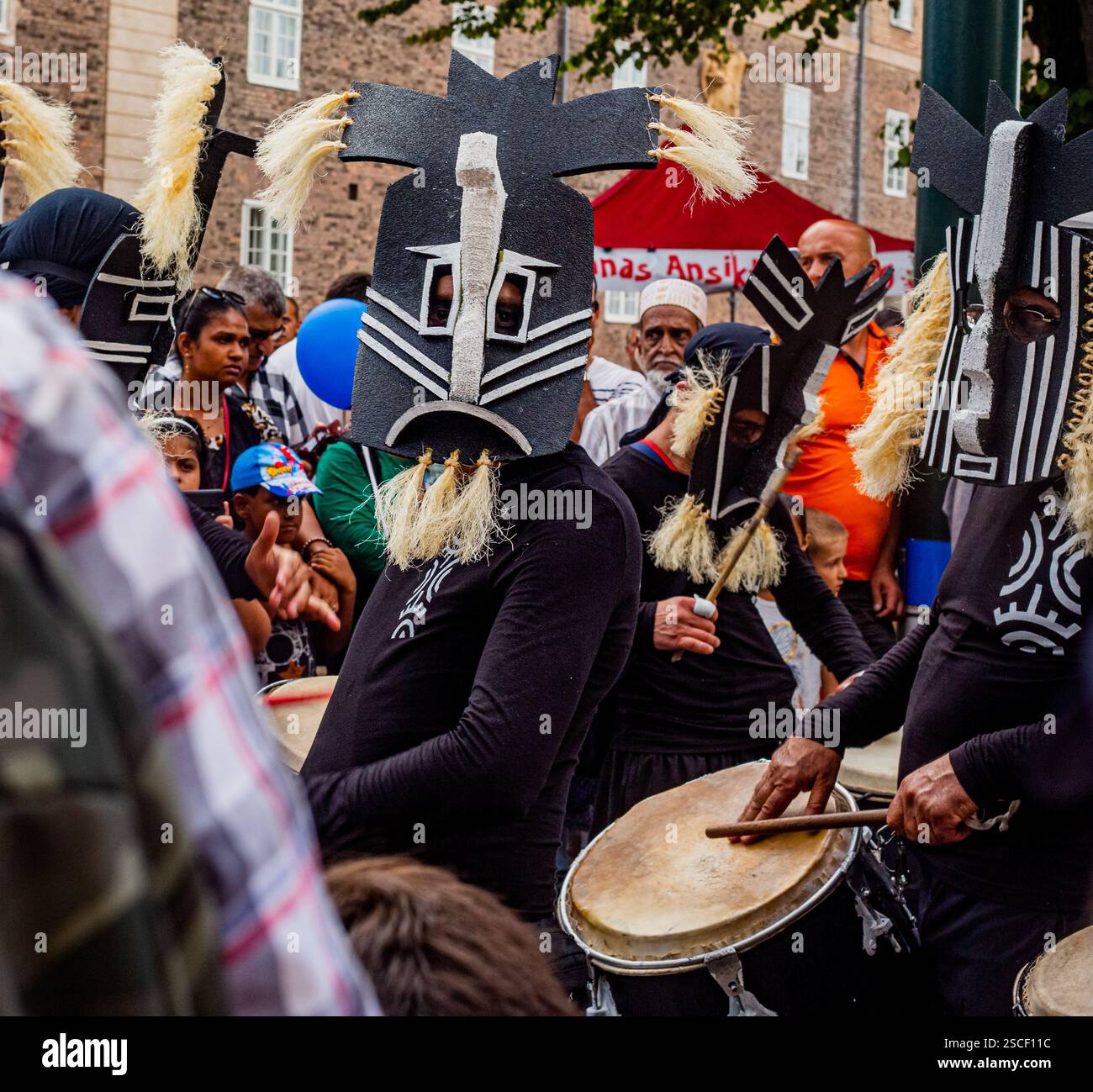 Local town carnival where people dress up in costumes from different ...