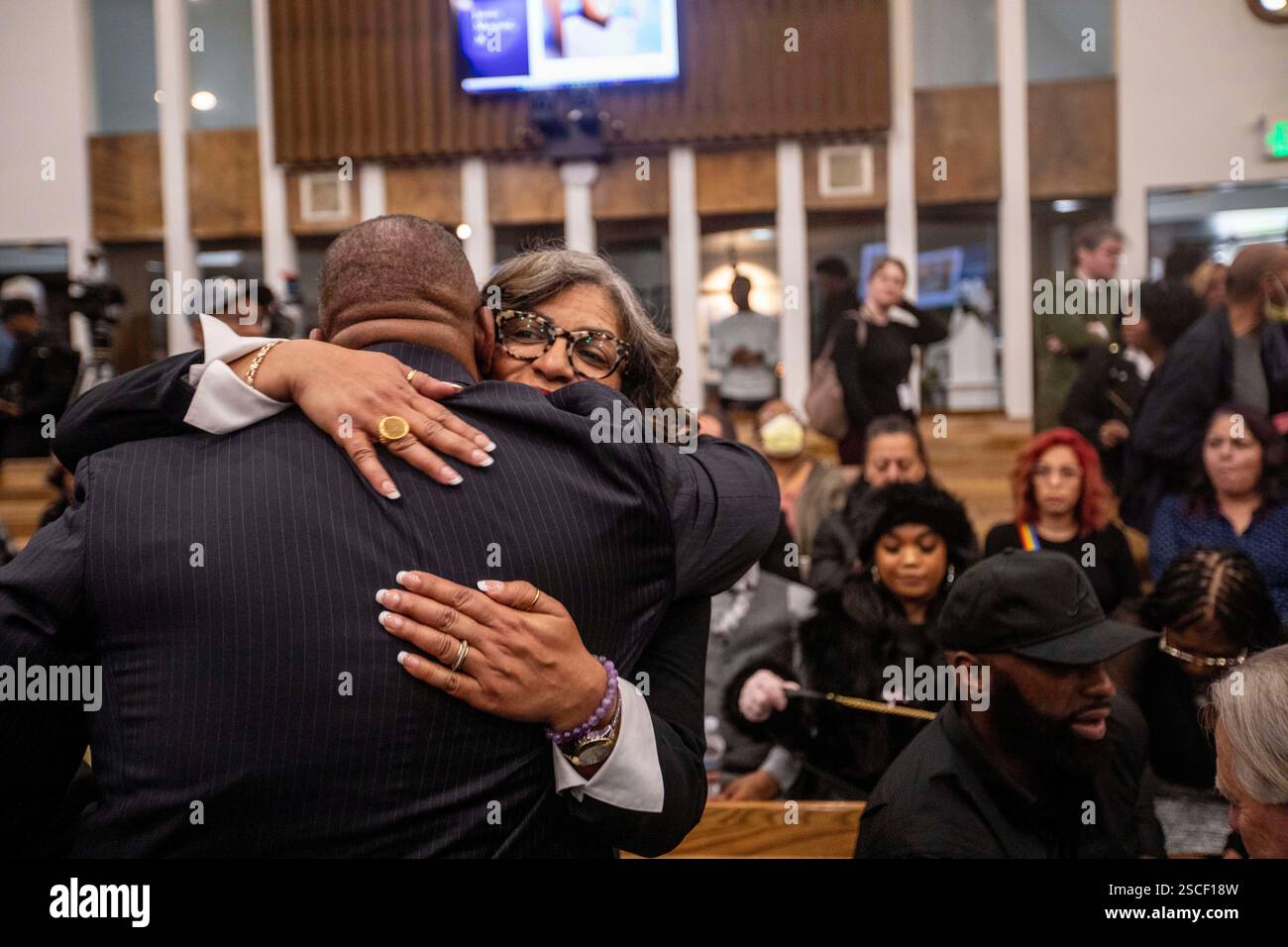Pasadena, California, USA. 6th Feb, 2025. Lisa Kelley hugs a mourner ...