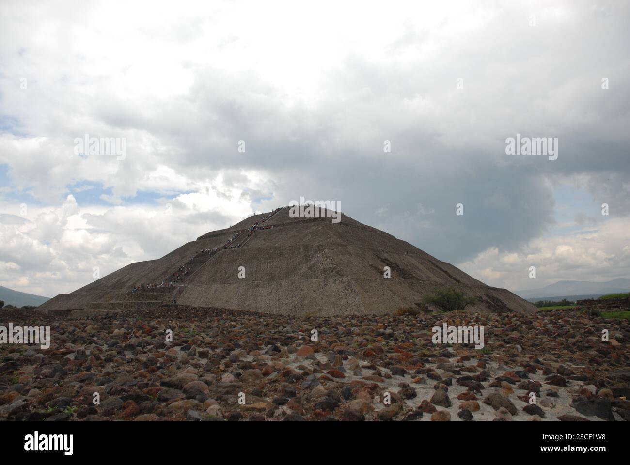 The landscape of the pyramids of Teotihuacan on a sunny and crowded day ...
