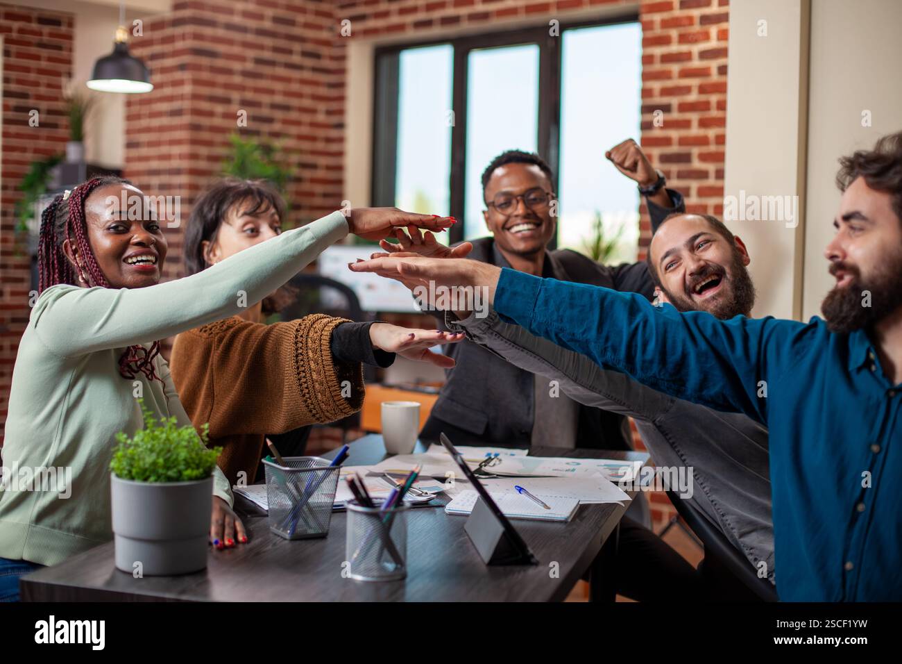 Diverse group coworkers engage hi-res stock photography and images - Alamy