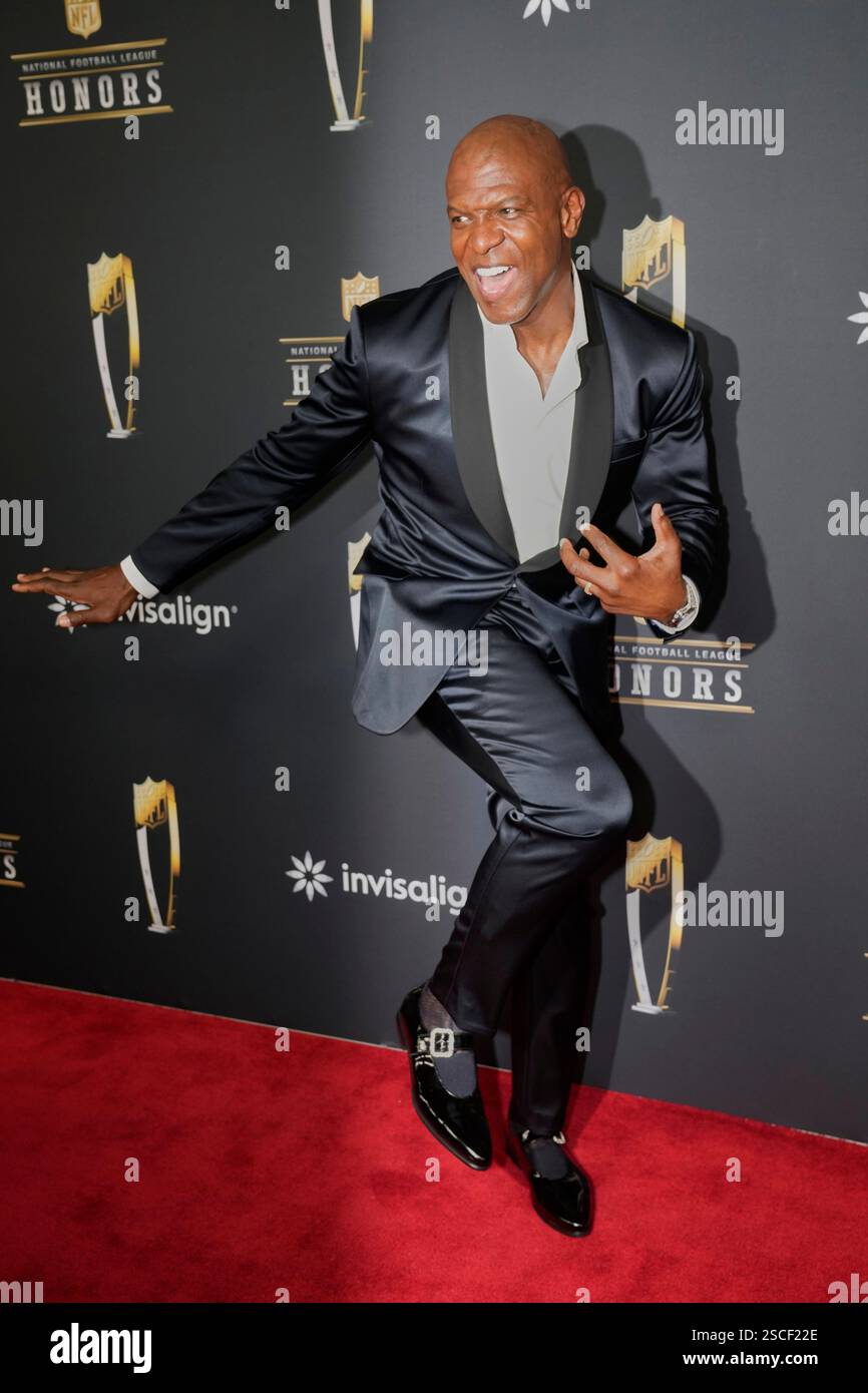 Entertainer and former NFL player Terry Crews poses on the red carpet ...