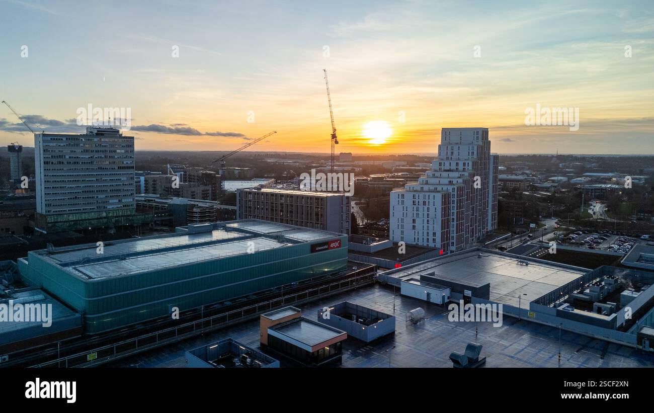 Aerial view of Stevenage town center at sunset with construction cranes ...